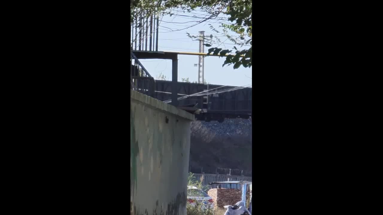 Electric train appears suspended on elevated track in Hebei, China