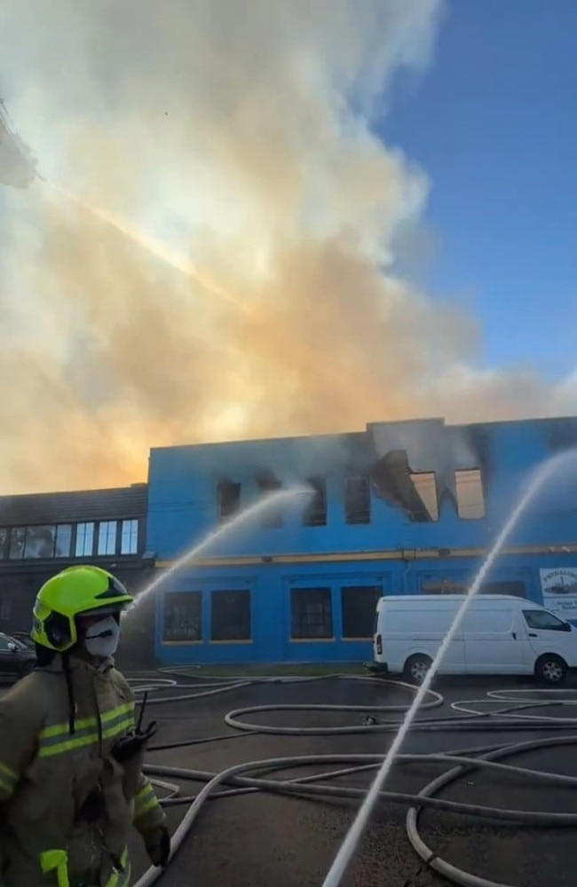 Bakery up in flames near busy train station