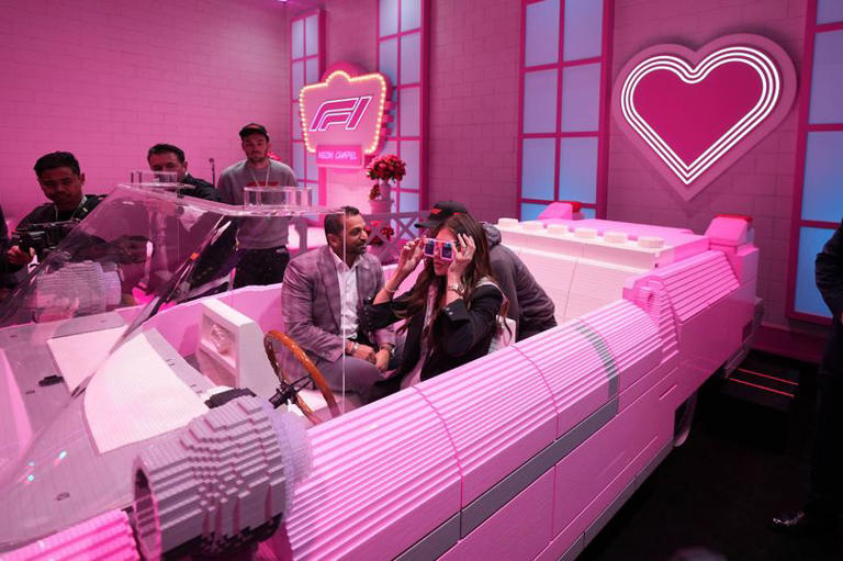 Kash Patel and Kristi Noem take a joyride in life-size pink Lego ...