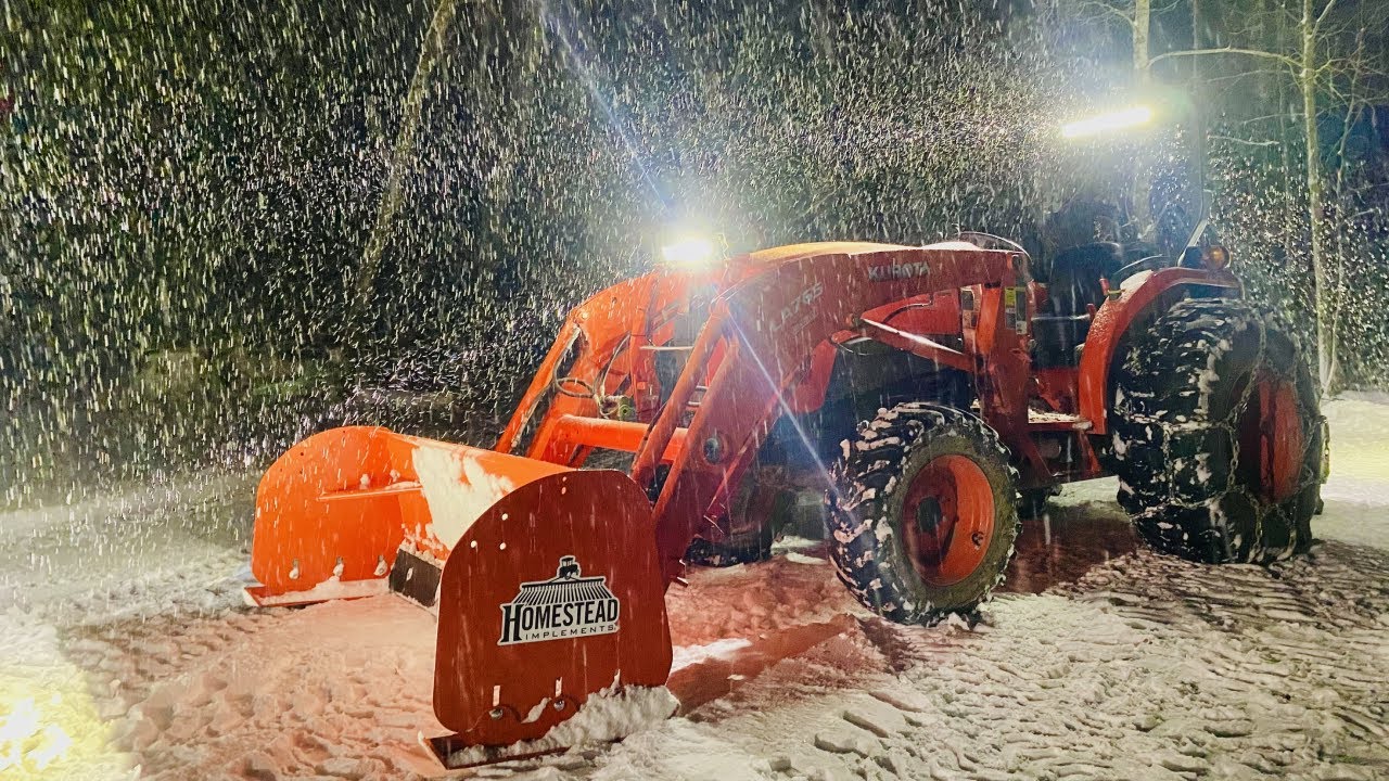 Nighttime snow plowing with my Kubota tractor