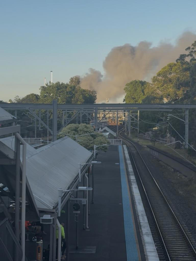 Bakery up in flames near busy train station