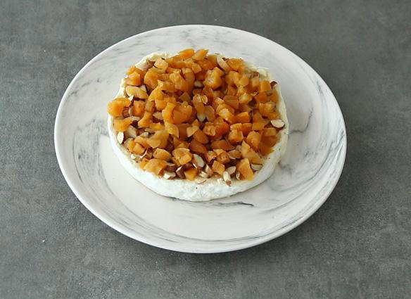 Stuffed brie with apricots and almonds