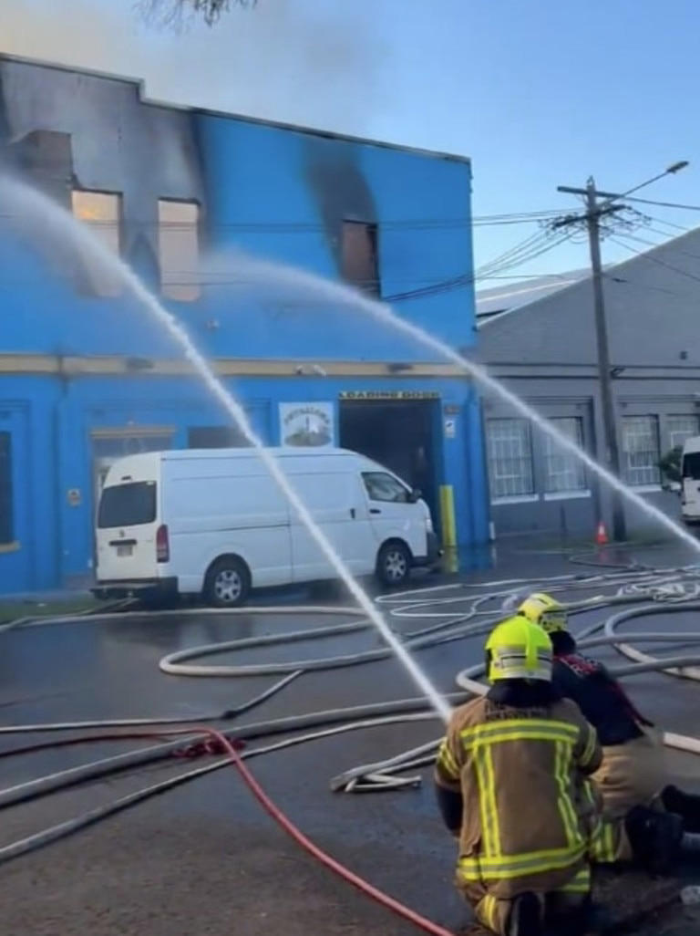Bakery up in flames near busy train station