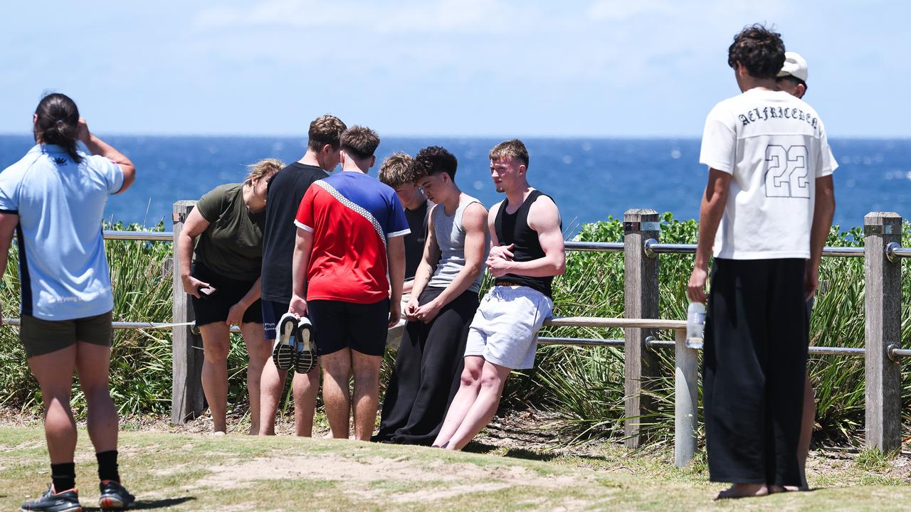 Sad scenes after teen swept out to sea