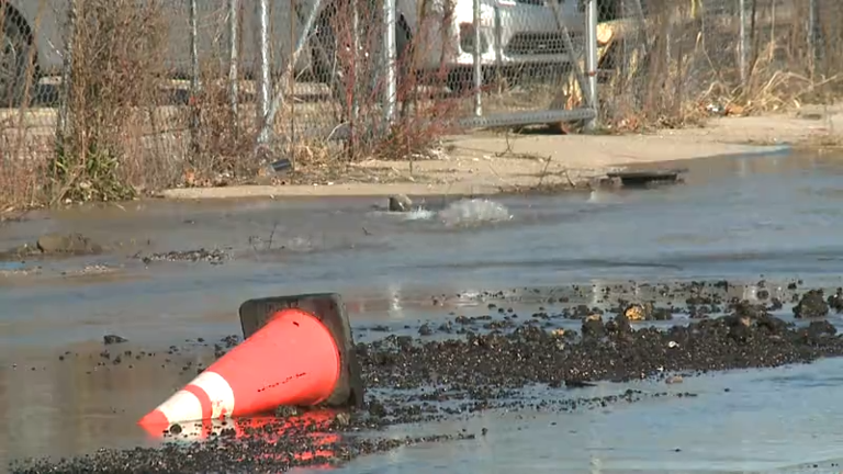 Crews working to repair broken water main on Washington Street in ...