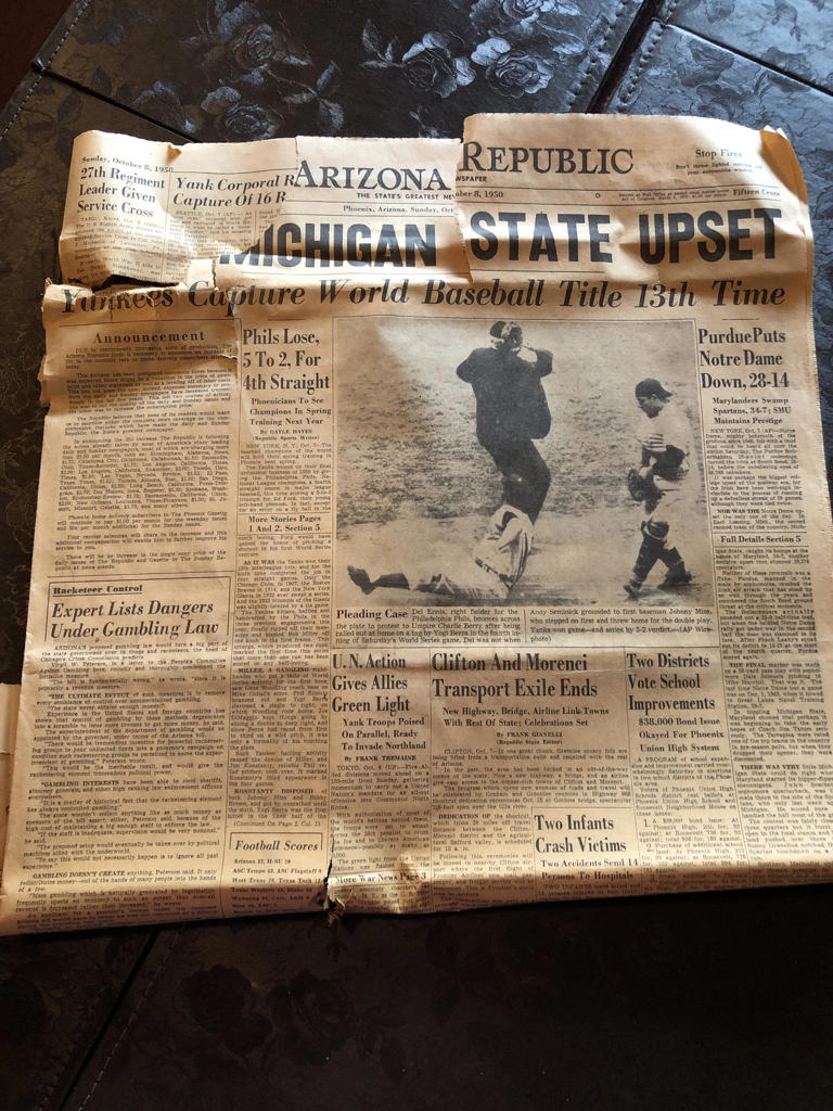 Woman finds 1950 Arizona Republic newspaper unpacking vintage table