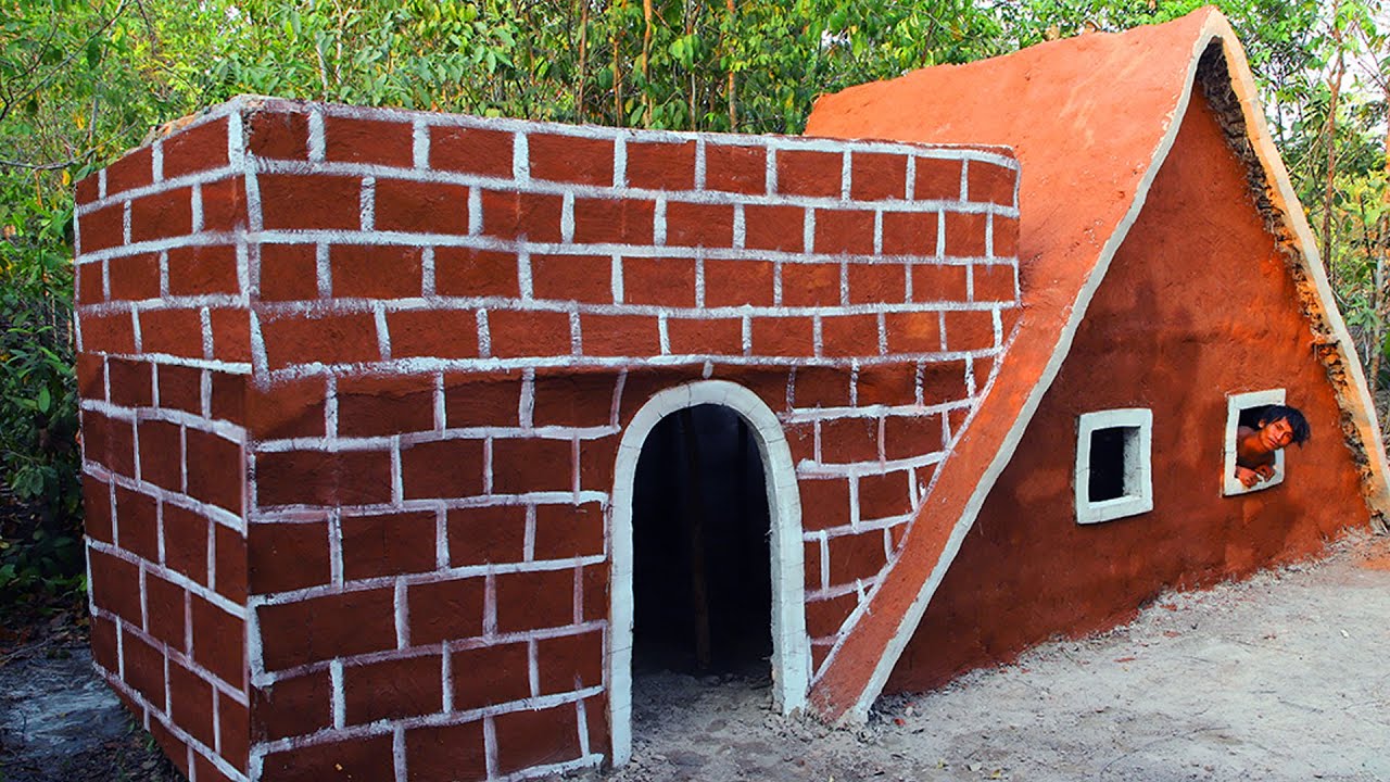 Building a two-story jungle hut using only primitive tools & natural ...