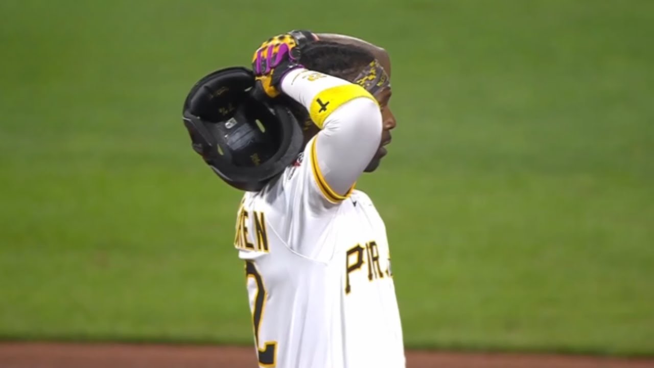 A fan just fell from the 21 foot fence onto the field at PNC Park