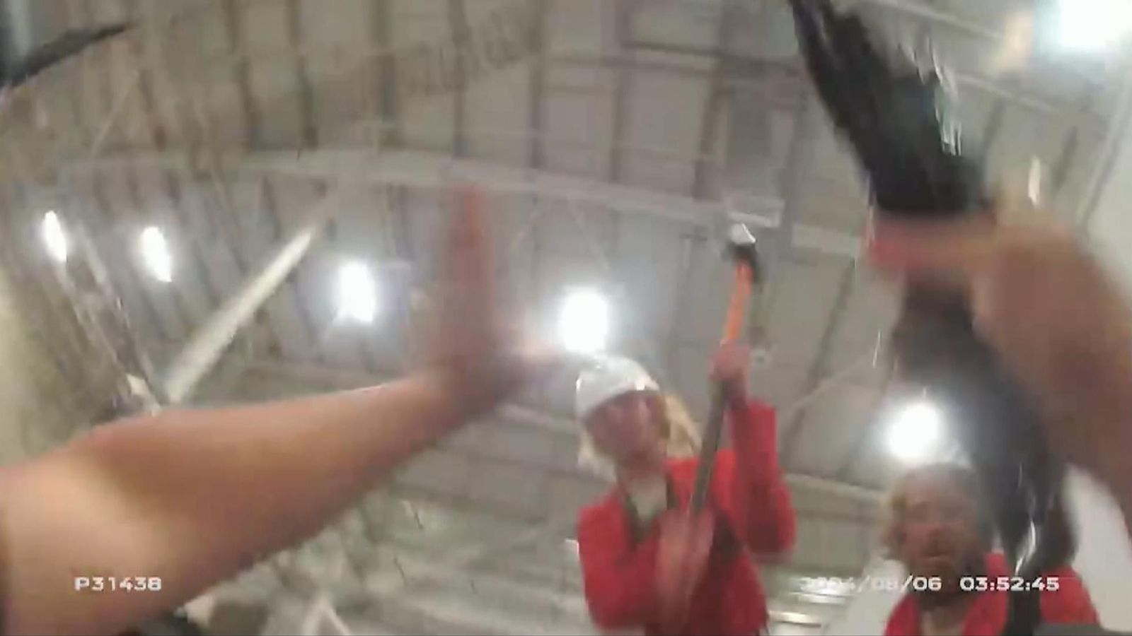 Bodycam footage of alleged sledgehammer attack on police shown at trial ...