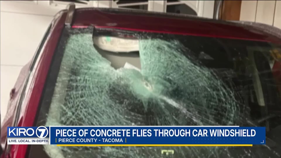 VIDEO: Piece of Concrete flies through car windshield in Tacoma