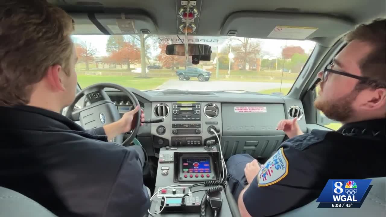 Emergency medical technician Pierce Ragland and paramedic Dan Medford ...