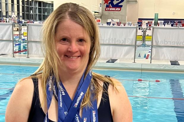 Island athlete wins four golds at British Down Syndrome Swimming ...