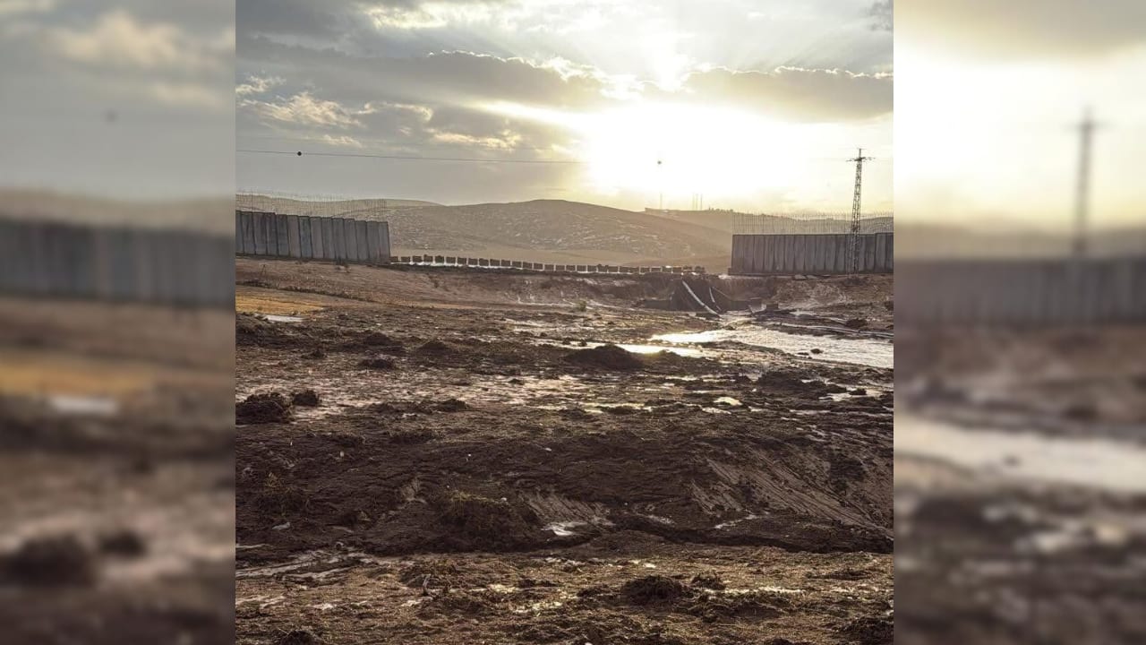 Flooding collapses West Bank security fence section near Hebron ...