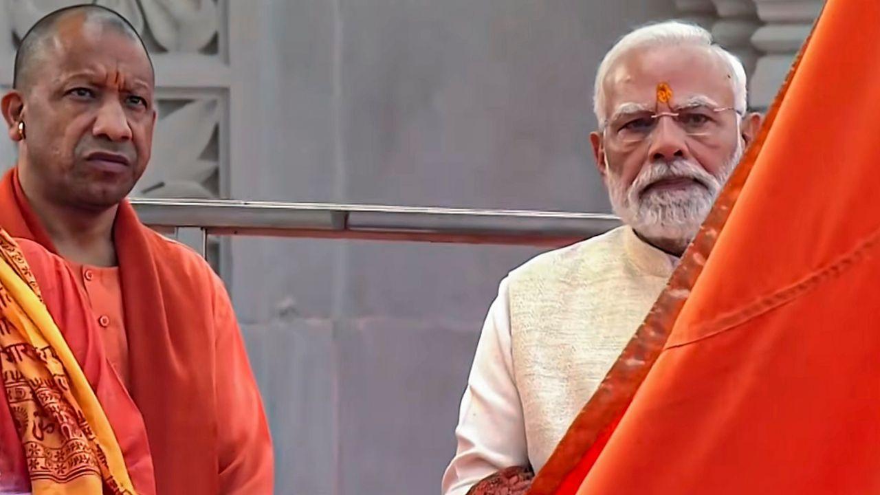 IN PHOTOS PM Modi and RSS chief Mohan Bhagwat hoist a saffron flag atop ...
