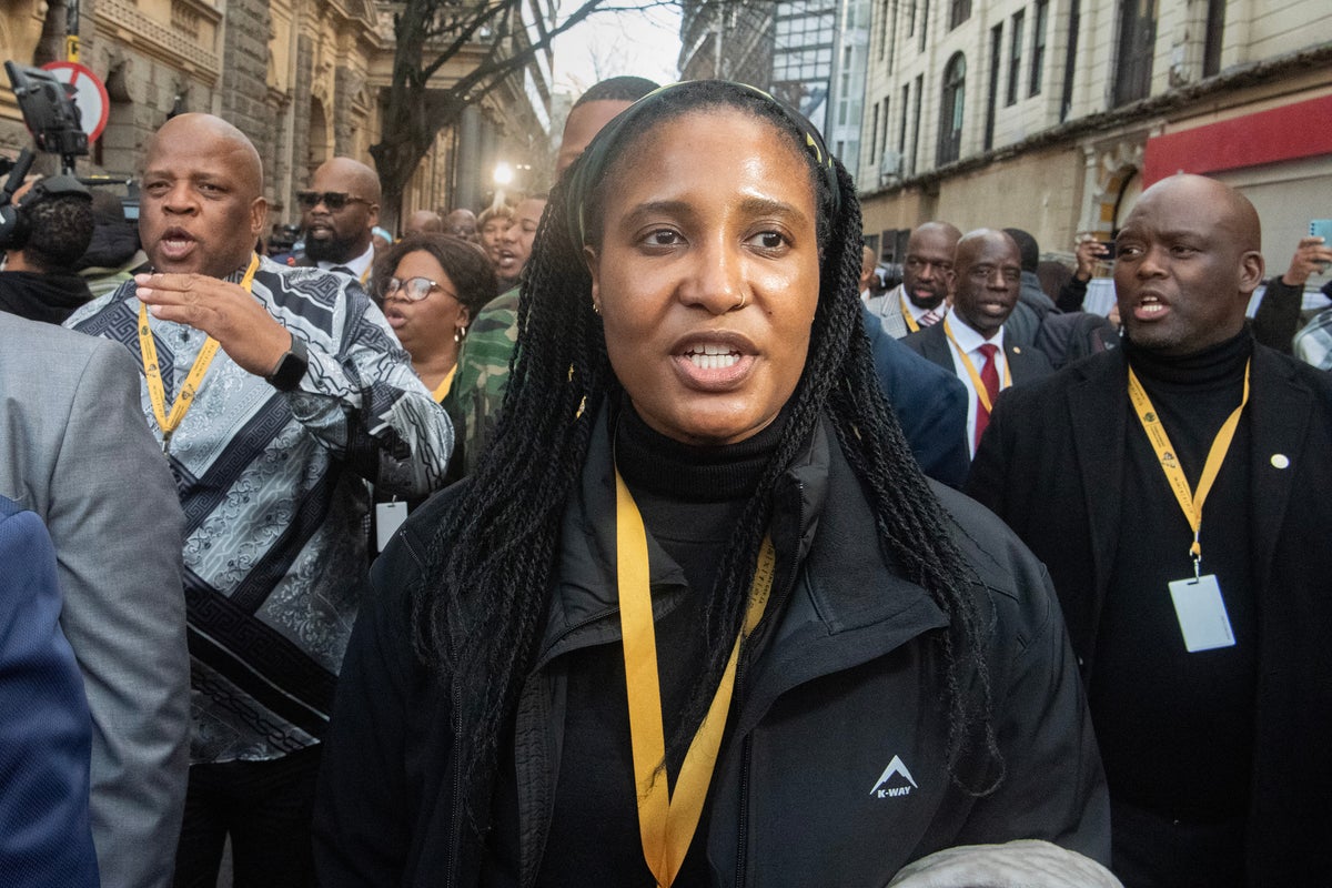 Daughter of ex-SA leader accused of luring men to fight for Russia