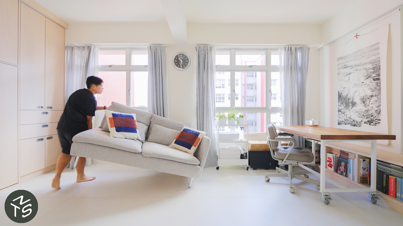Watch a small Singapore home transform with movable furniture