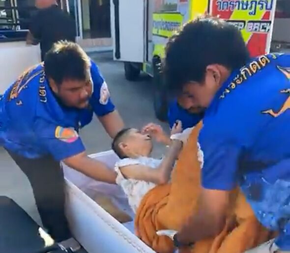 Horror as woman inside coffin bursts into life just seconds before ...