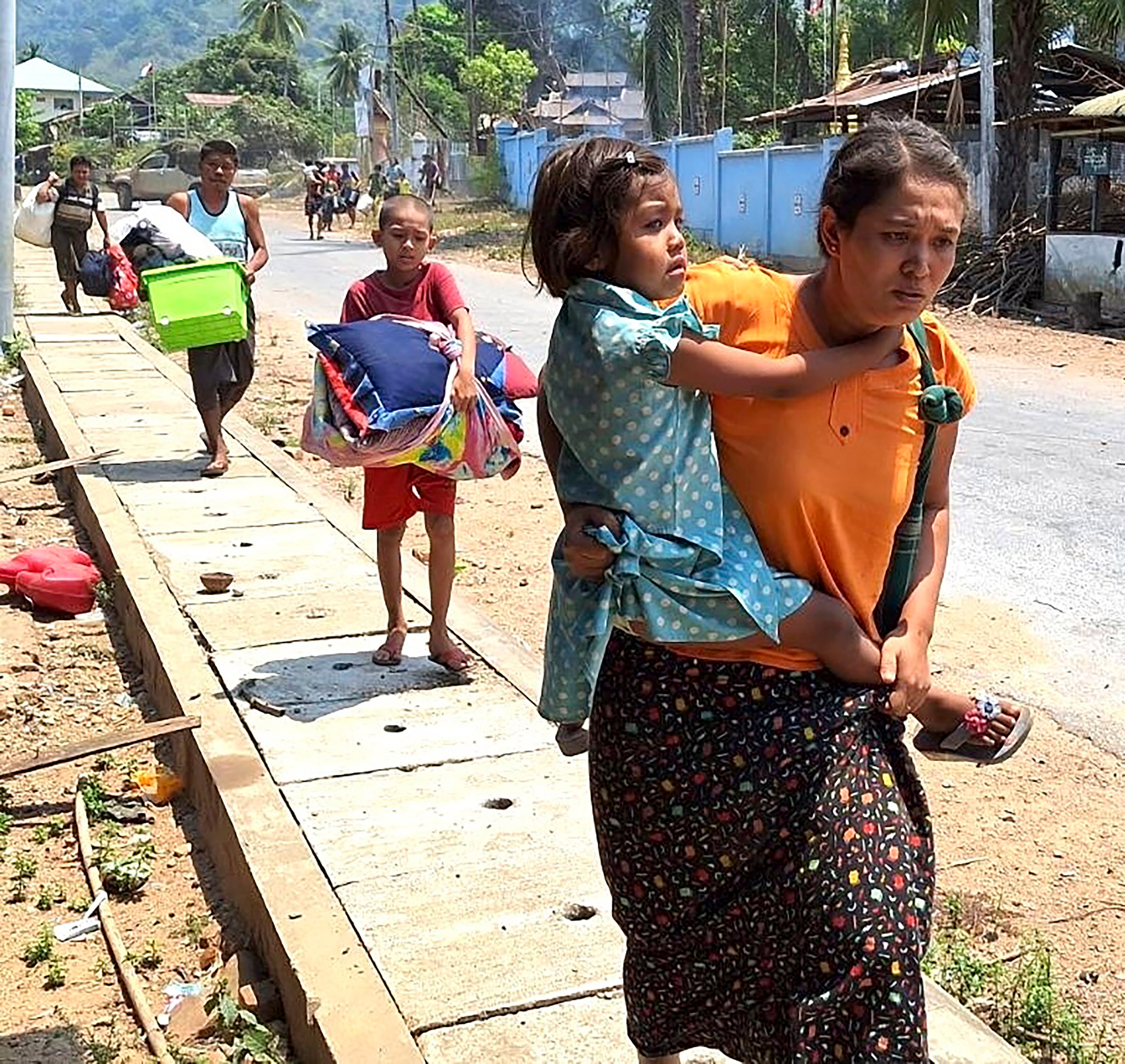 US cites Myanmar’s ‘sham’ election to withdraw immigration status