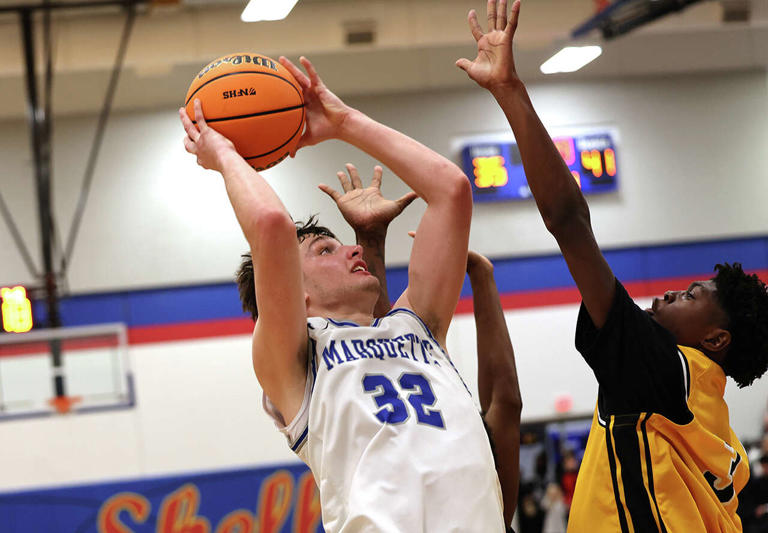 Marquette falls to U City in Medford's first game back as coach