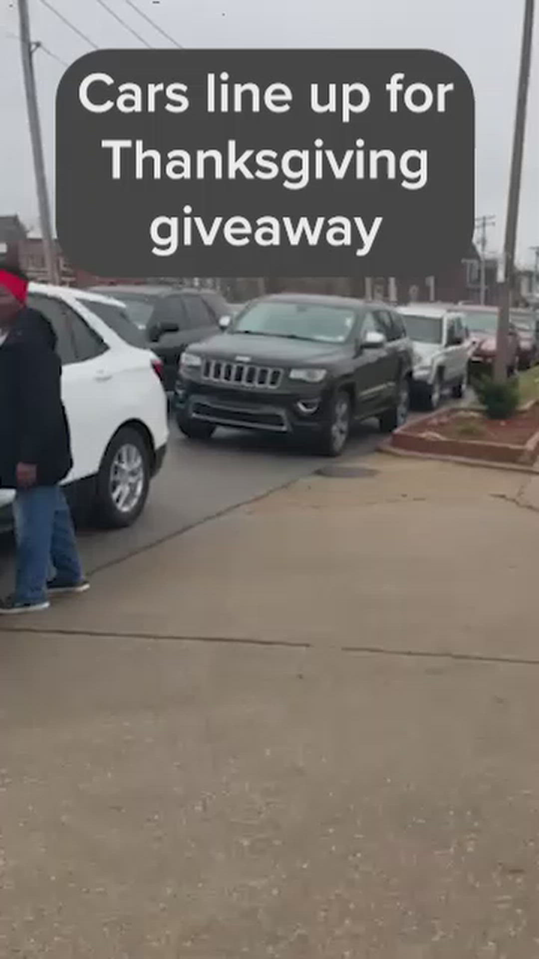 Cars line up for Thanksgiving giveaway