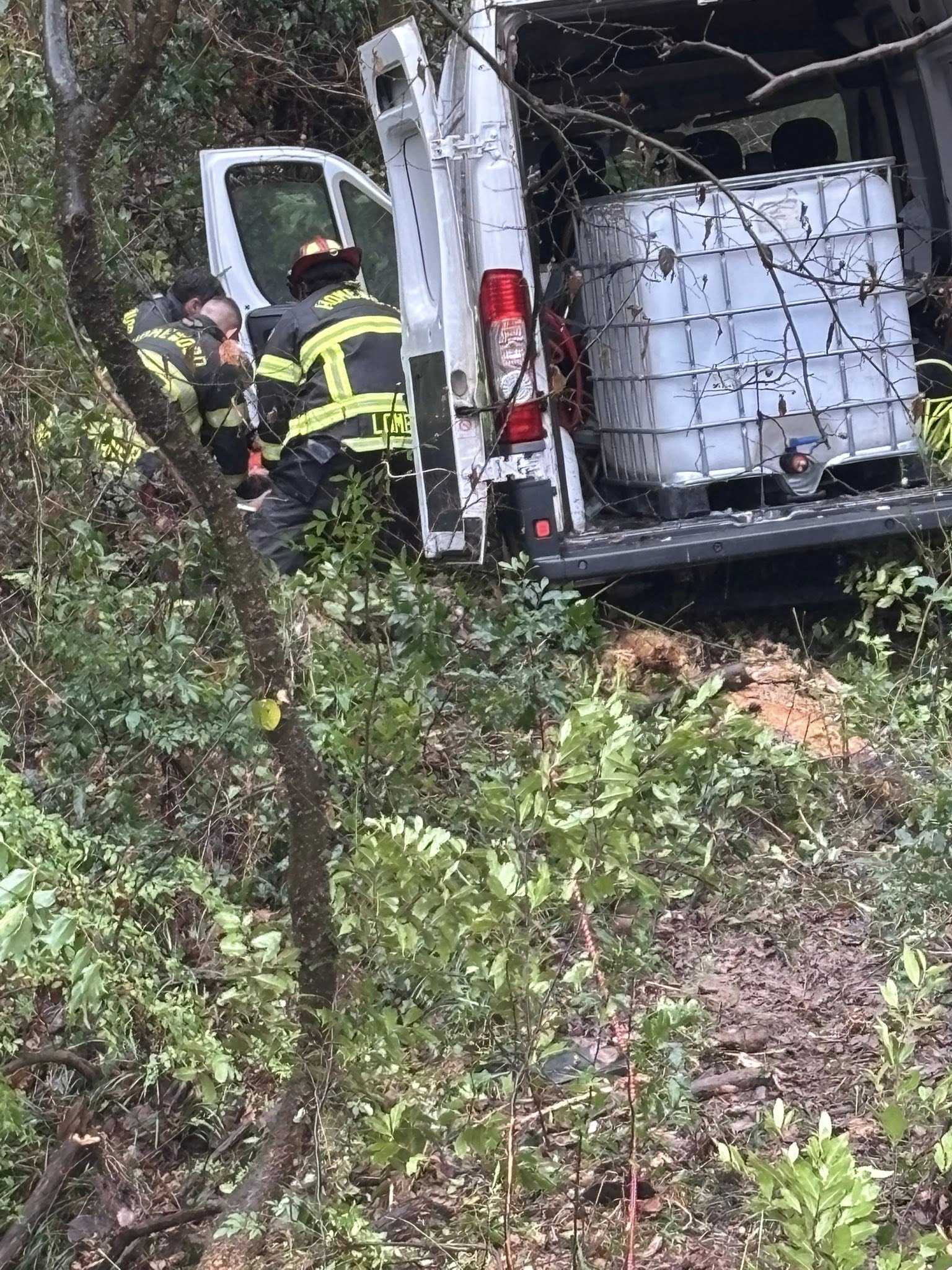 First responders use ropes to rescue driver down embankment in Homewood