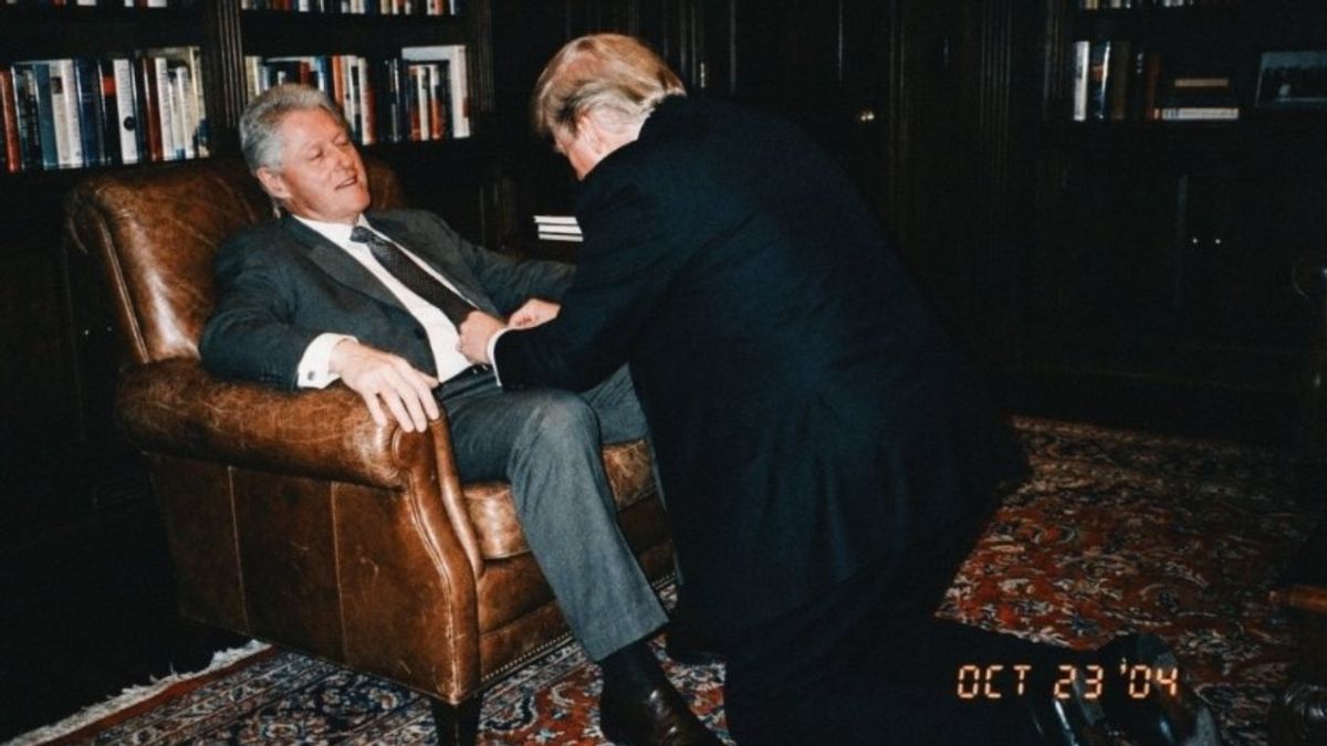 Photo of Trump kneeling, removing Clinton's pants isn't what it seems