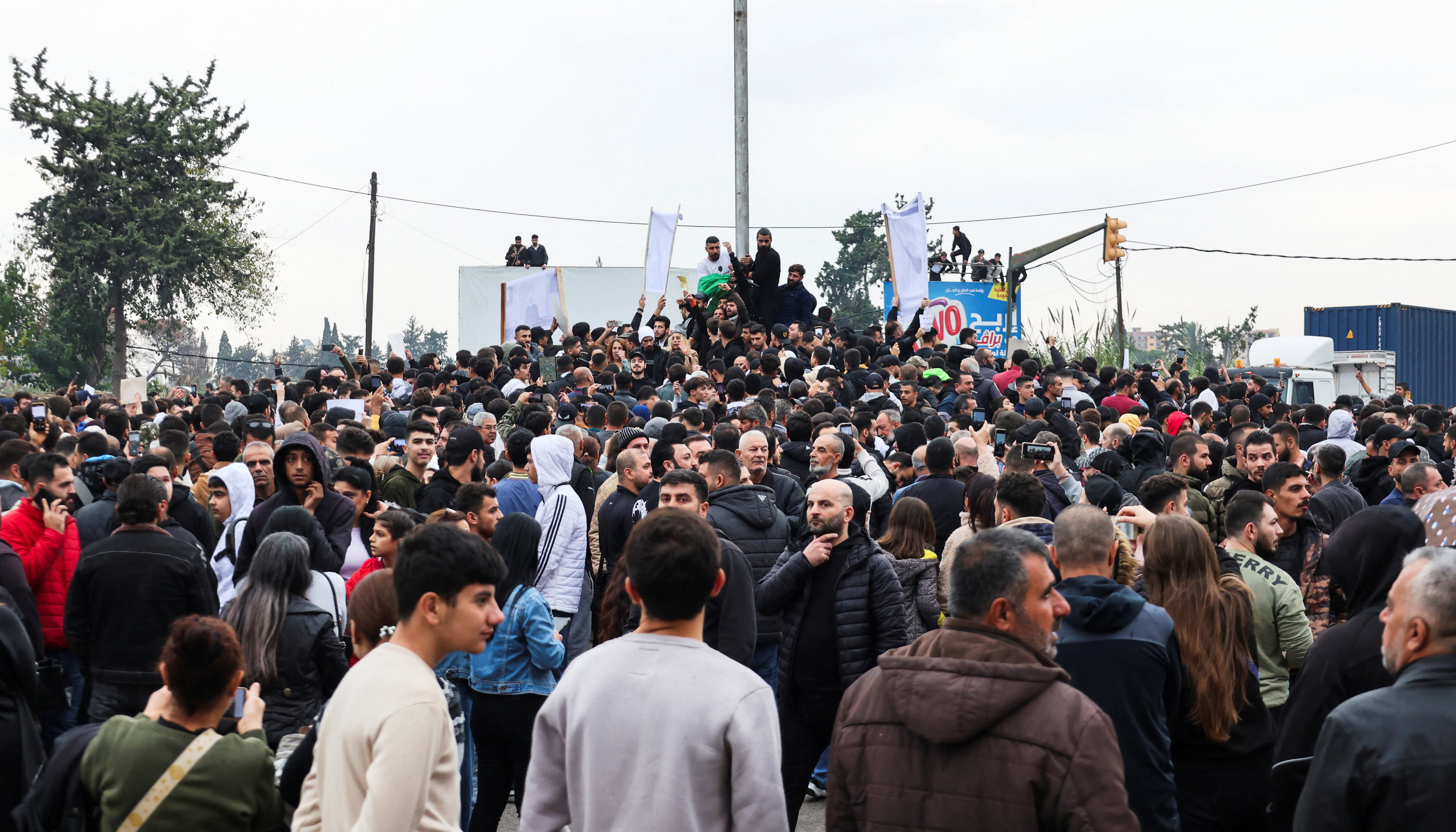 Gunfire used to disperse protests in Syria's Alawite heartlands