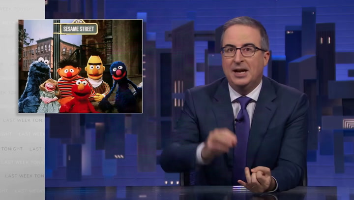 John Oliver’s Bob Ross Auction Smashes Record in Battle Against Trump Cuts