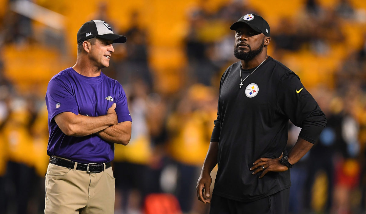 Mike Tomlin reacts to the Ravens firing head coach John Harbaugh