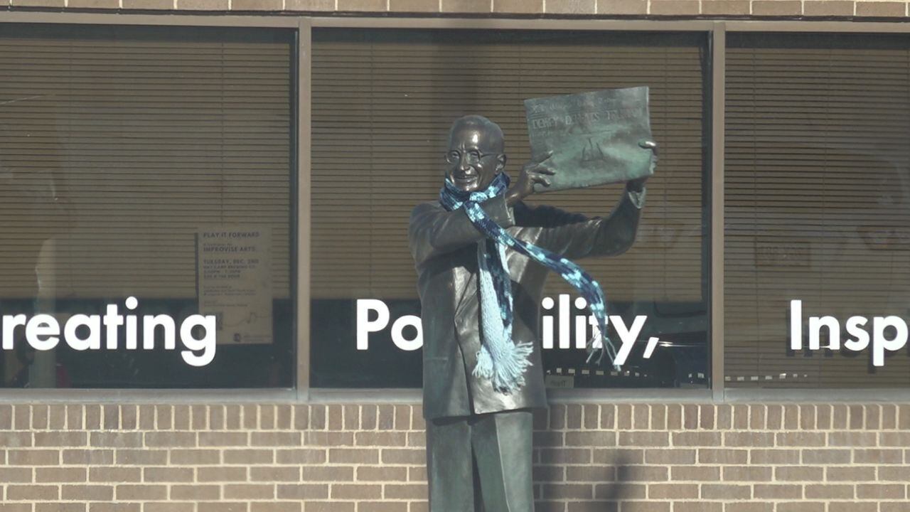 Presidential statues serve as donation spots for coats, hats