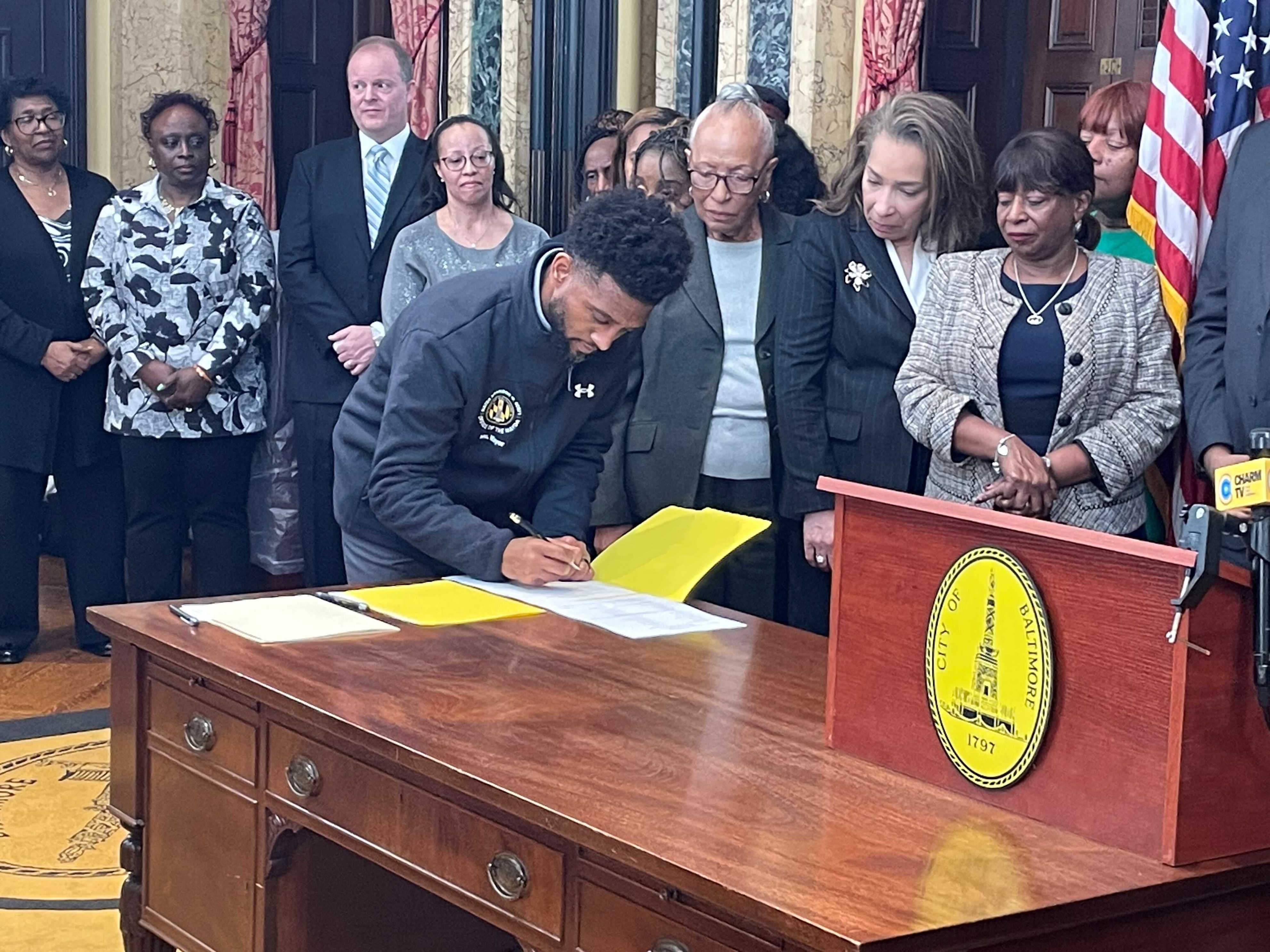Mayor signs union contracts, marking historic moment for Baltimore