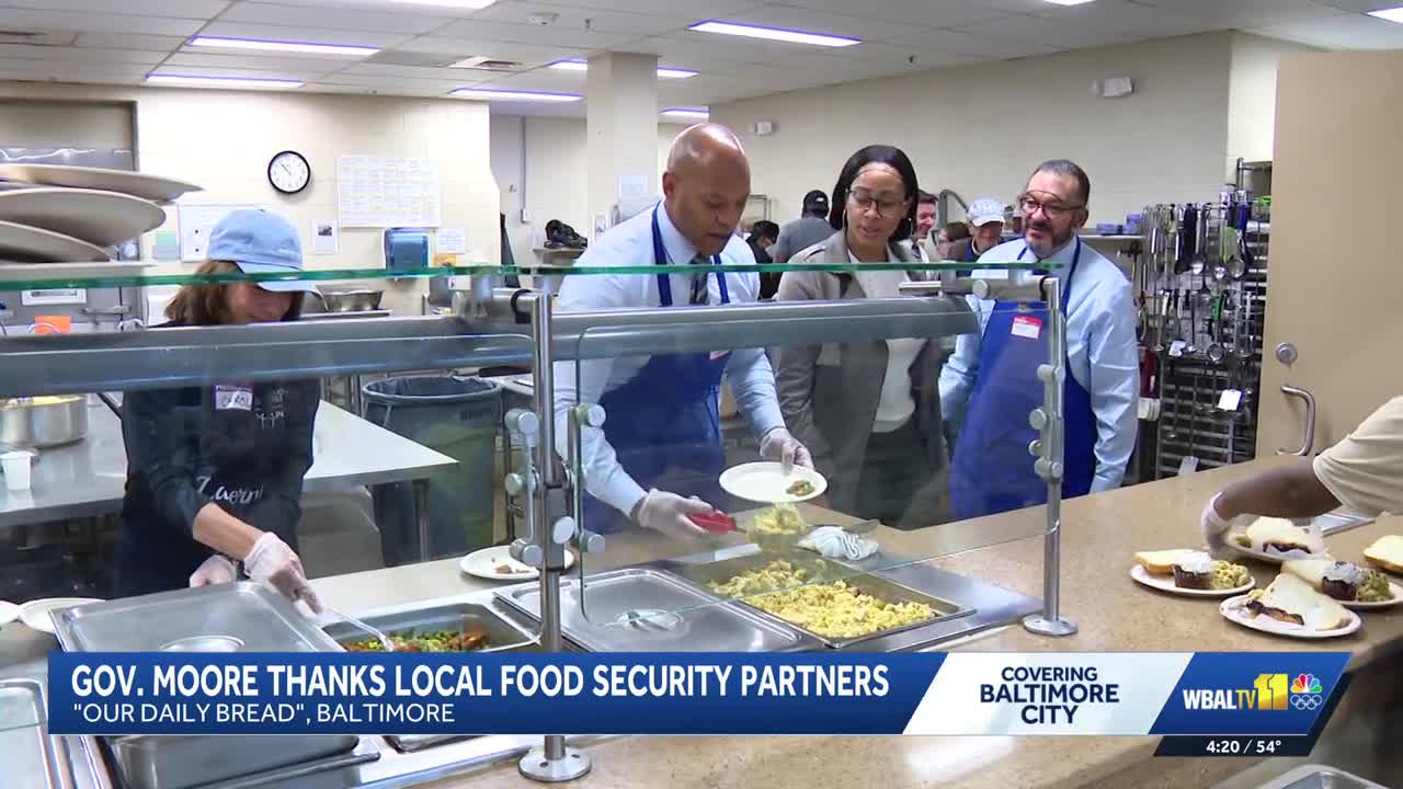 Gov. Moore helps serve food at emergency food center