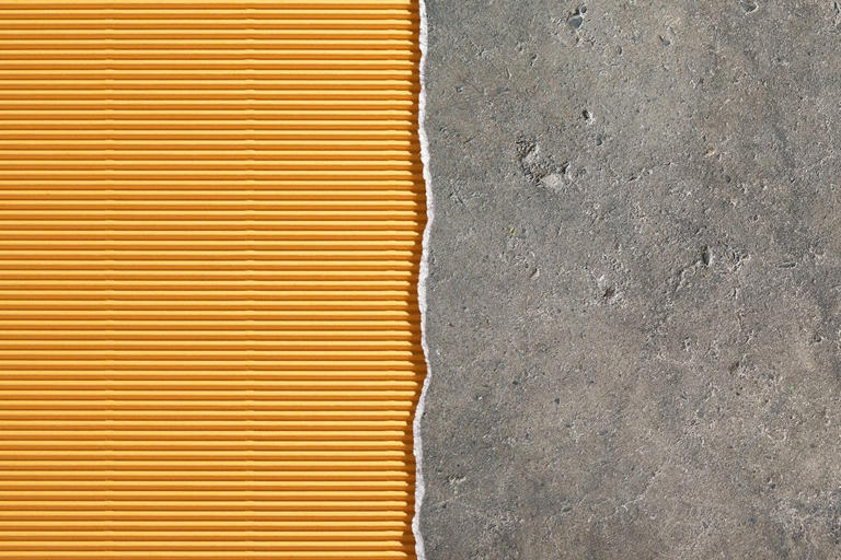 Scientists found a way to turn recycled cardboard into concrete-like ...