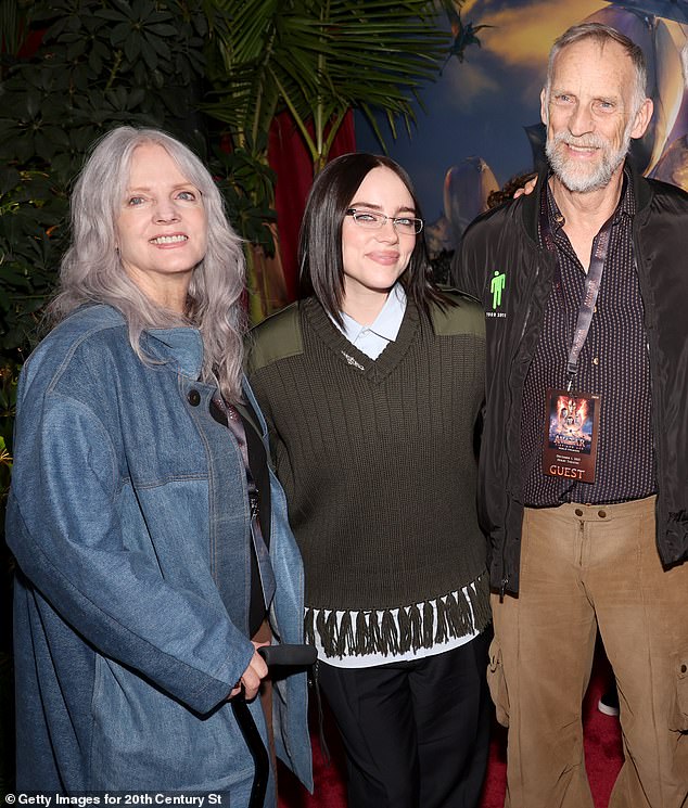 Billie Eilish poses for rare photo with her parents whom she is still ...