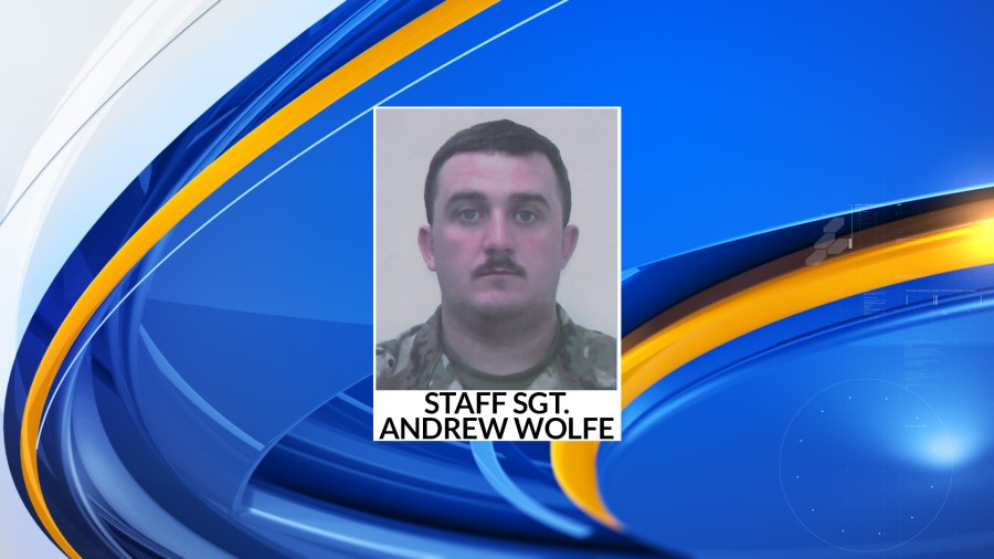 Family accepting cards for West Virginia National Guard Staff Sergeant ...