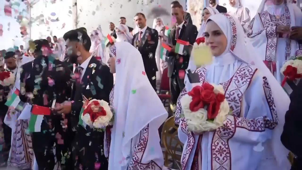 Mass wedding in Gaza Strip offers rare glimpse of hope in war-wracked ...
