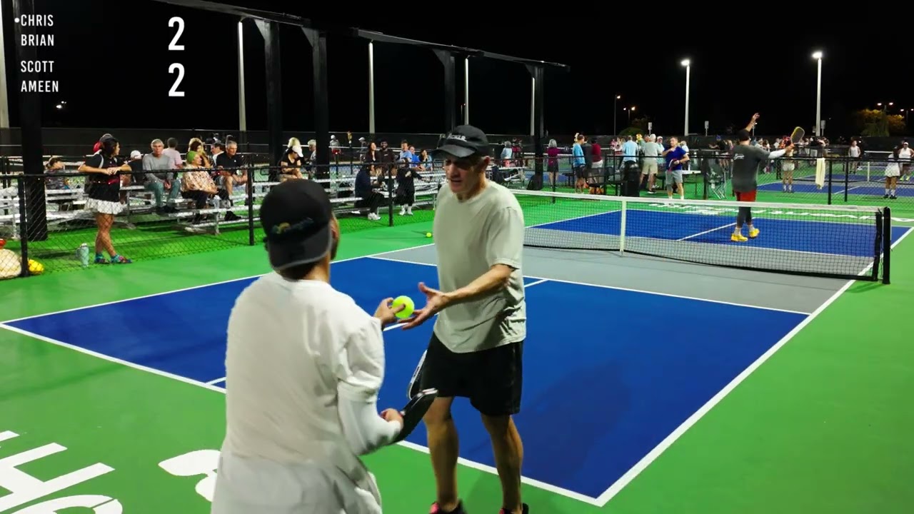 Intense Pickleball Action In A Split Age Moneyball Pool Match