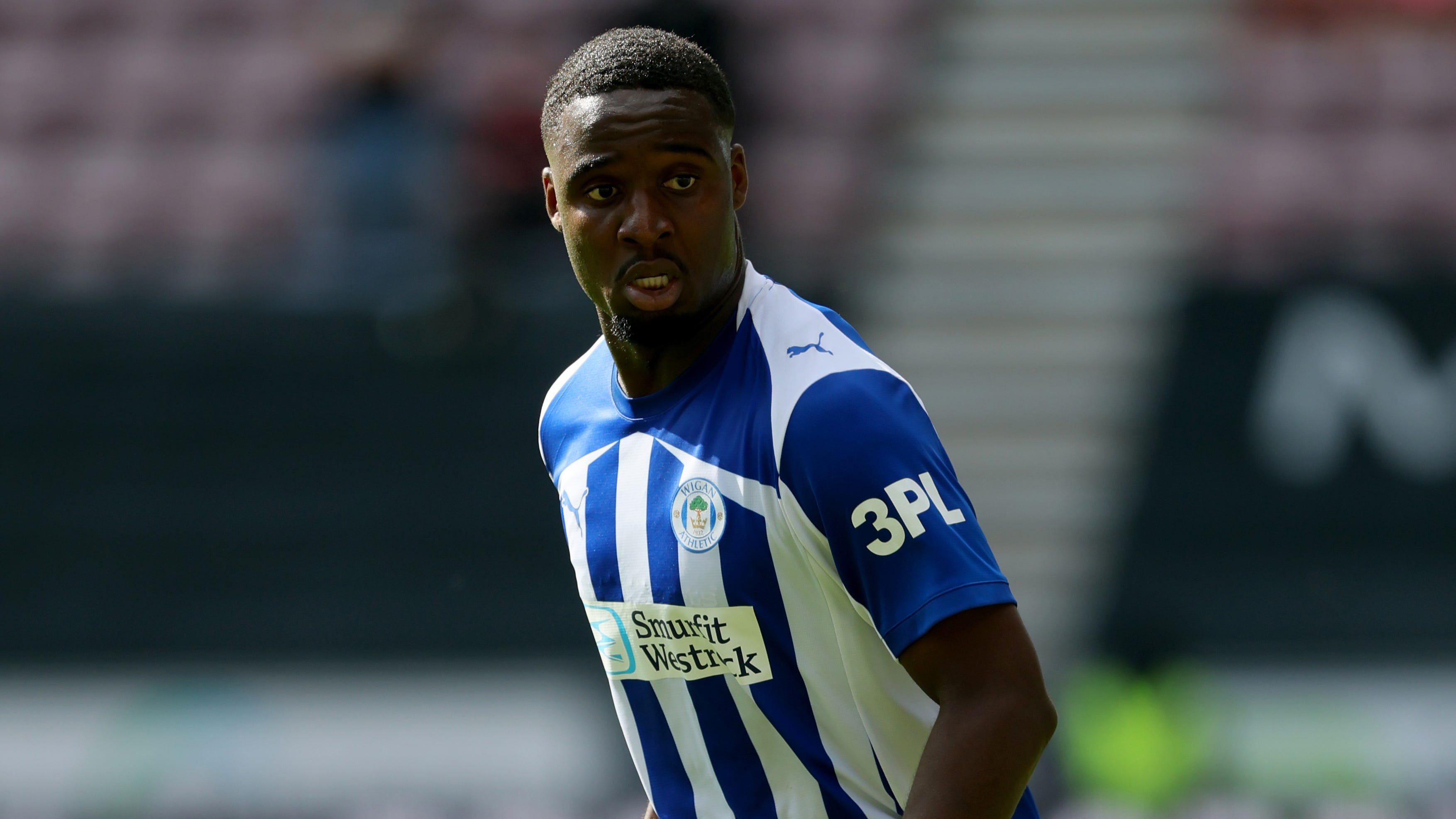 Wigan claim scrappy victory at home to Burton to move into top half