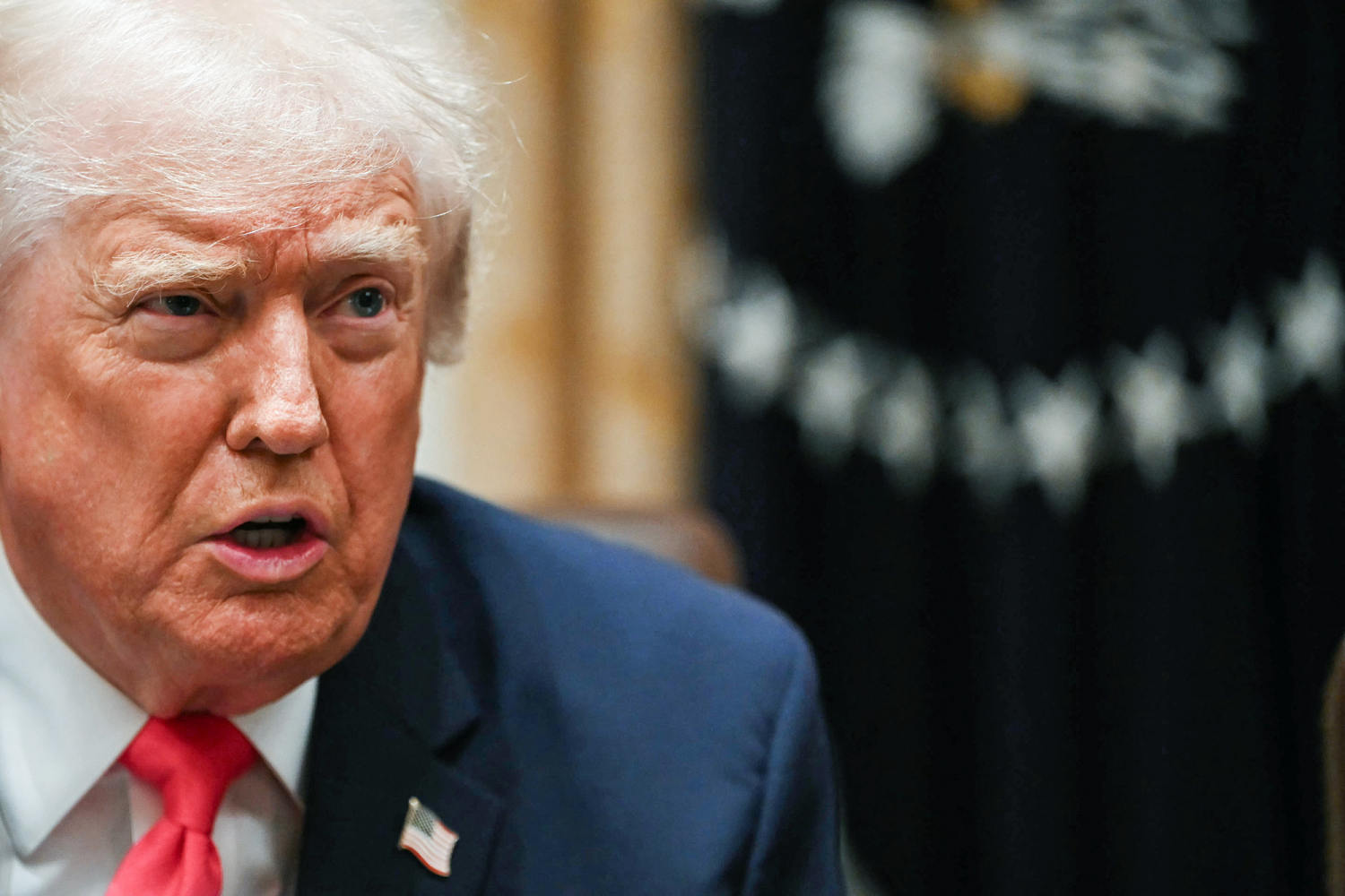 Trump calls Ilhan Omar 'garbage' and says Somalis should 'go back to ...