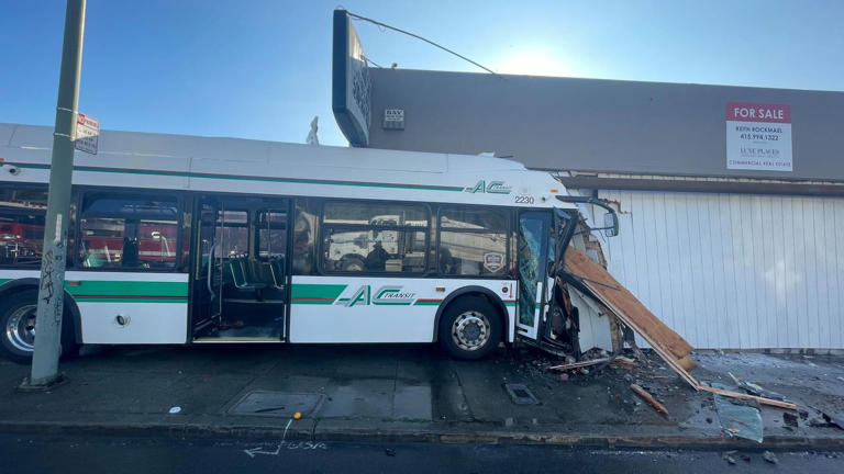 AC Transit bus crashes into Oakland building, sends 11 to hospital