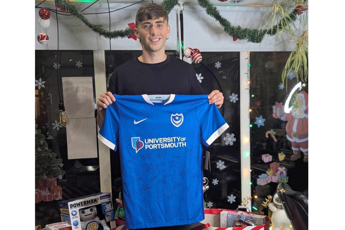 Pompey FC player donates signed shirt to support The Barbers annual toy ...