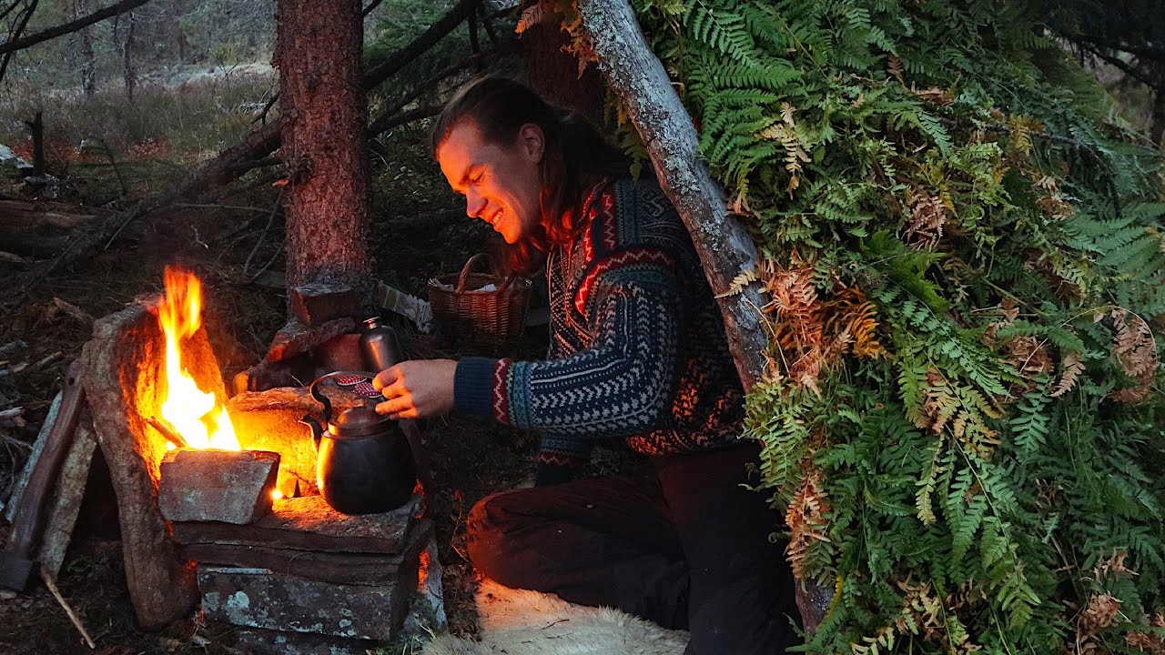 Nordic Forest Bushcraft – Hidden Shelter and Stone Fireplace Construction