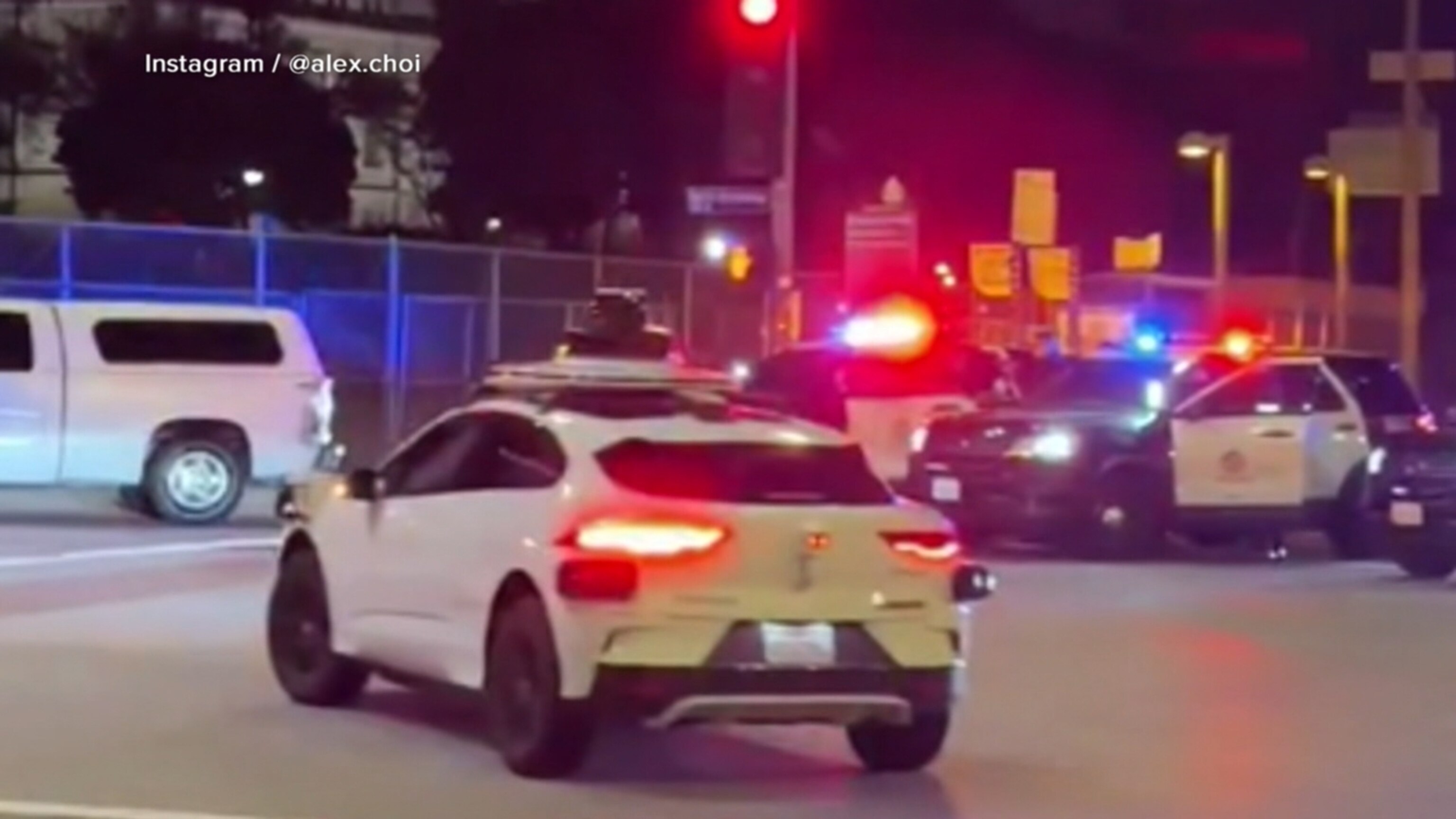 Self-driving taxi takes passenger through active police scene
