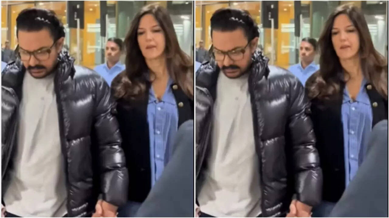 Aamir Khan and Gauri Spratt exchange smiles as they walk hand-in-hand ...