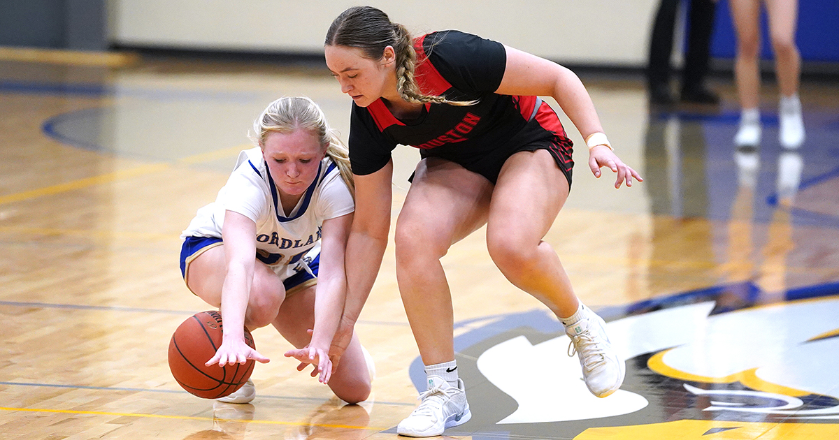 PHOTO STORY: Lady Tigers rally for season-opening overtime win