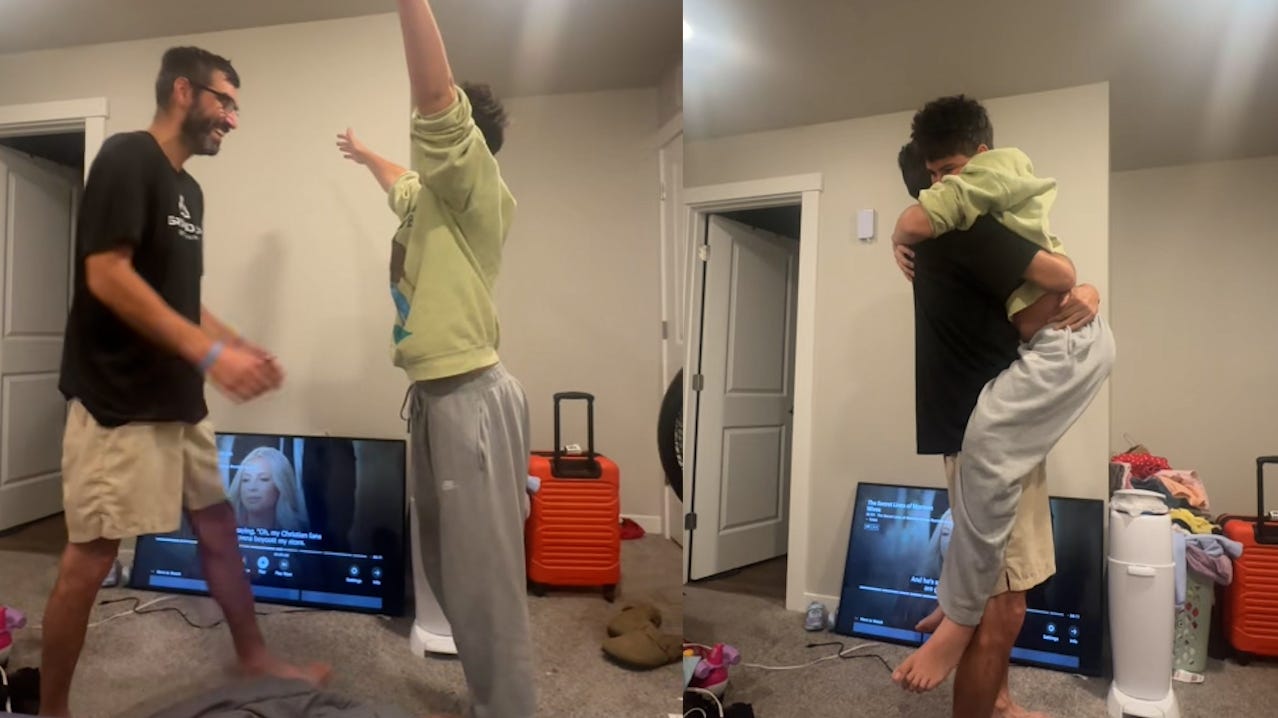 Father lifts teenage son one final time before he gets too big