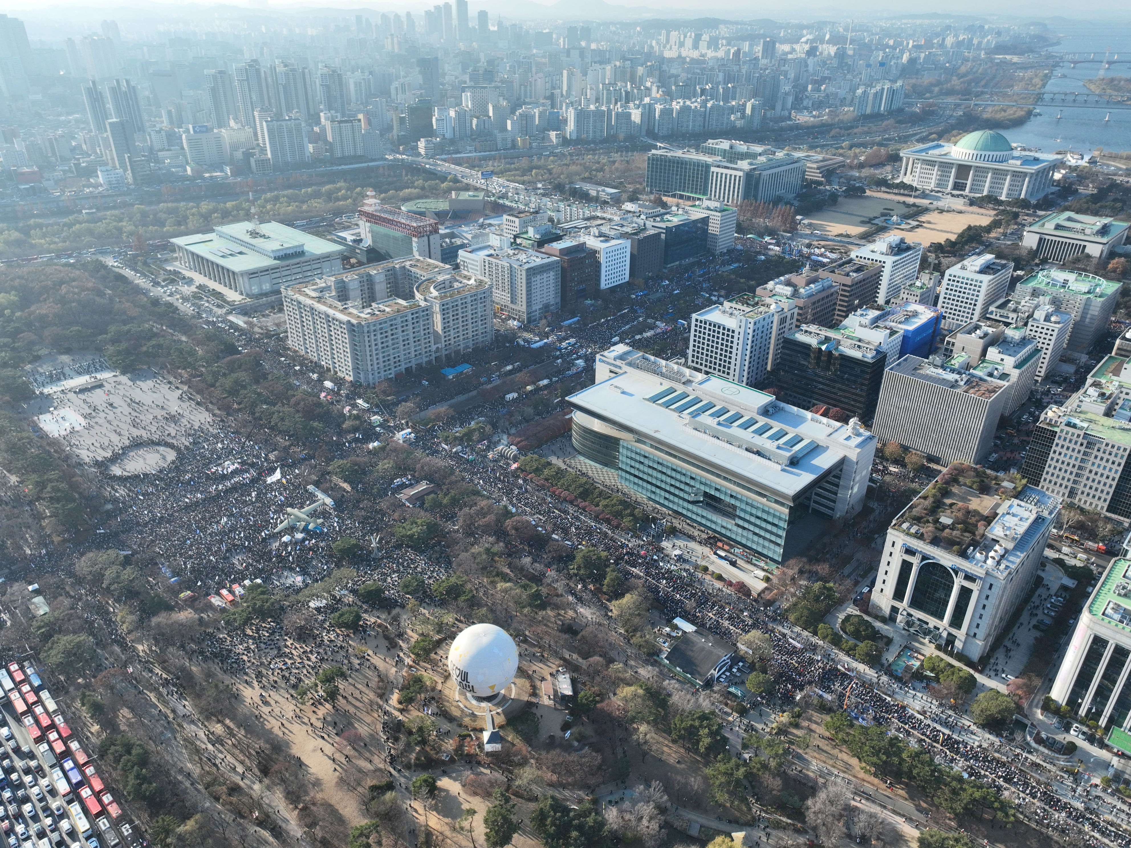 Seoul reflects on year of chaos as calm returns to National Assembly Plaza
