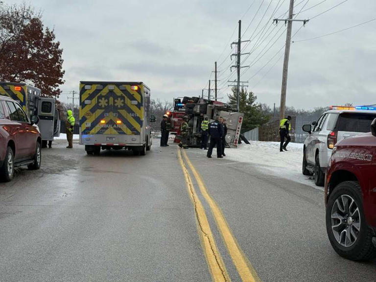 Ferguson snow plow truck overturns, worker injured