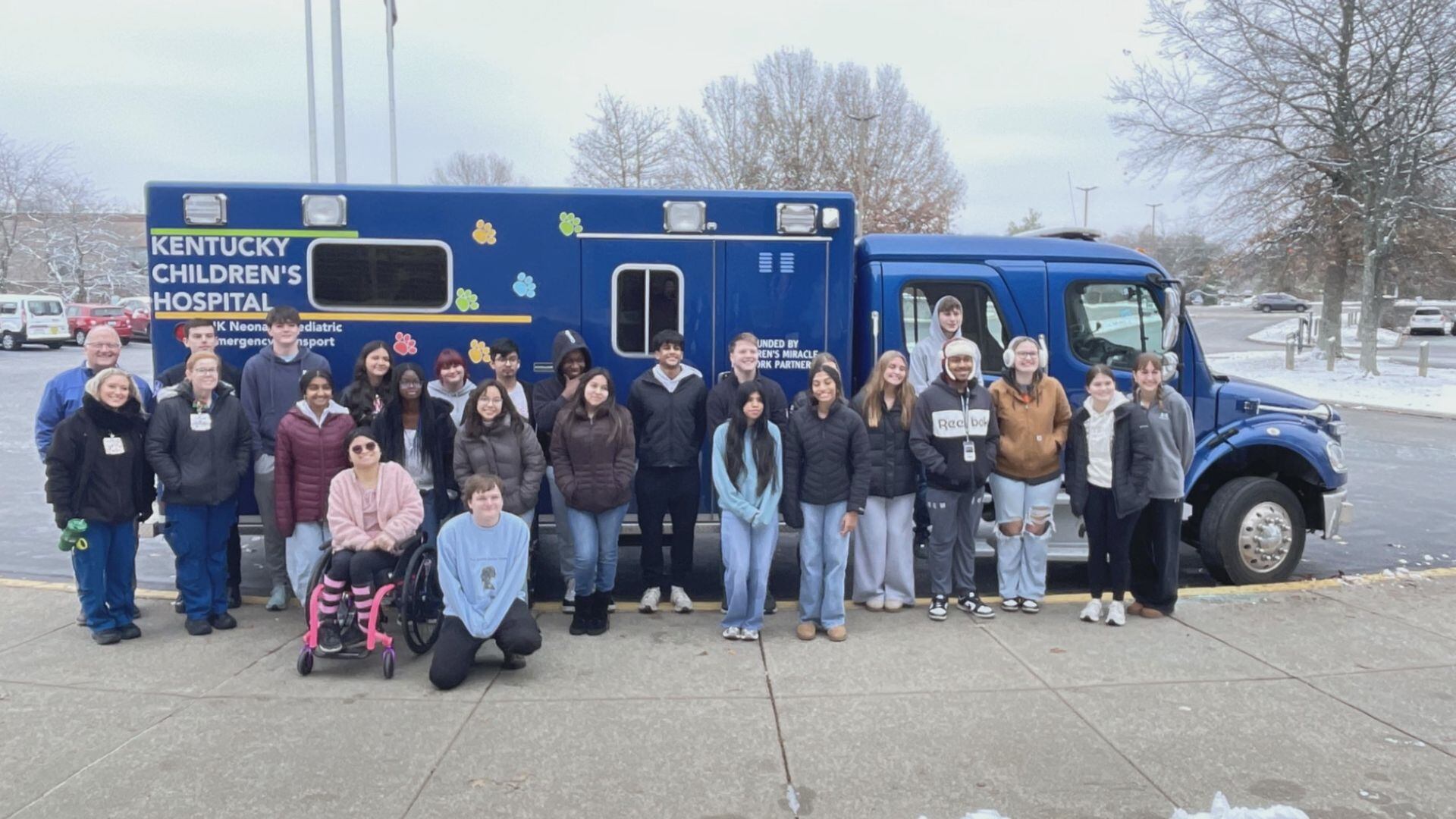 Dunbar High students stuff ambulance with toys for pediatric patients