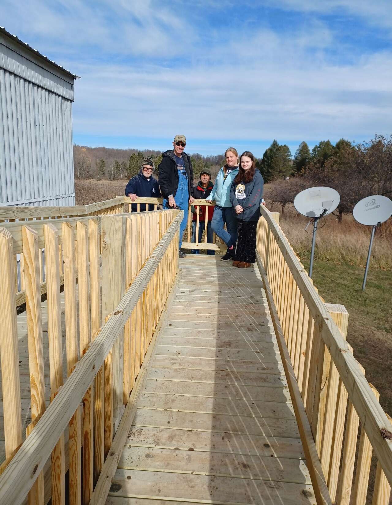 Manistee Habitat volunteers build accessibility ramp for teen